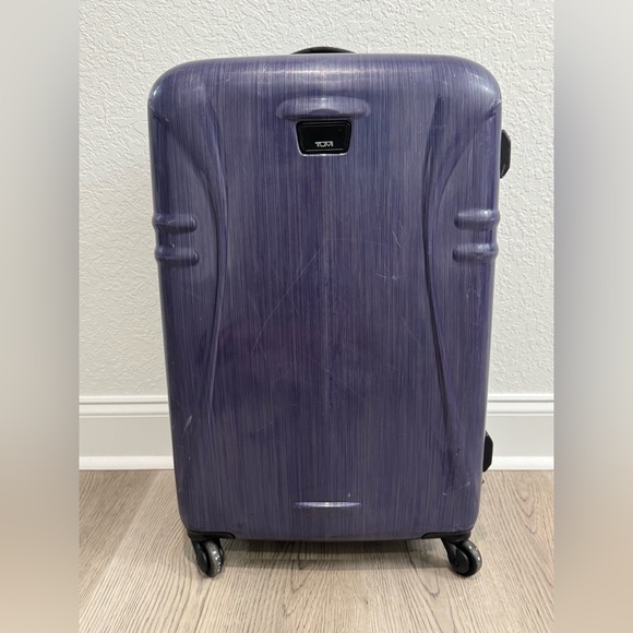 Tumi | Bags | Tumi Carryout Hardshell Wheeled Suitcase In Dark Purple ...